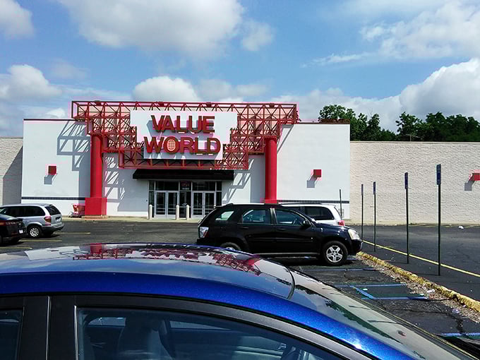 The striking red signage of Value World stands out against the blue sky, promising a treasure trove within.