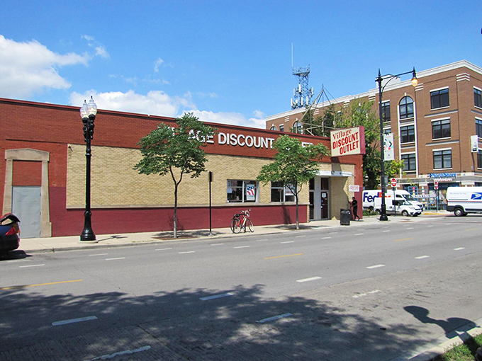 Nestled in Chicago's urban landscape, Village Discount Outlet's bright red sign beckons to savvy shoppers like a thrifting lighthouse.