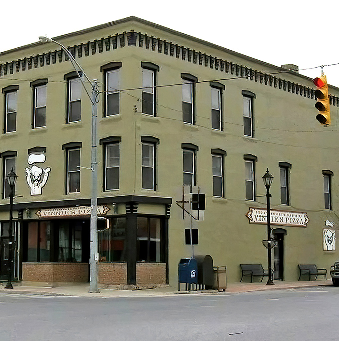 Downtown Troy's pizza headquarters &ndash; where that vintage-style sign promises comfort food that never disappoints.