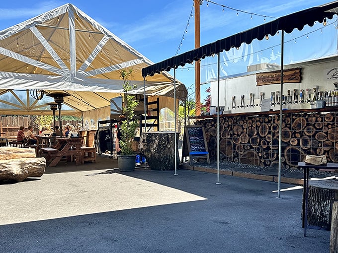 Outdoor BBQ paradise! String lights, wooden tables, and the promise of smoky delights create the perfect summer hangout.