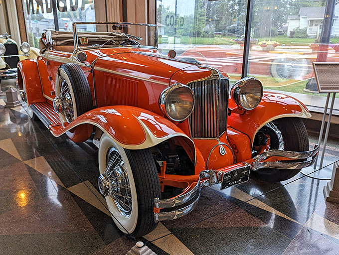 This flame-orange 1930 Cord L-29 Cabriolet makes modern supercars look like they're trying too hard. Subtlety was never this sexy.