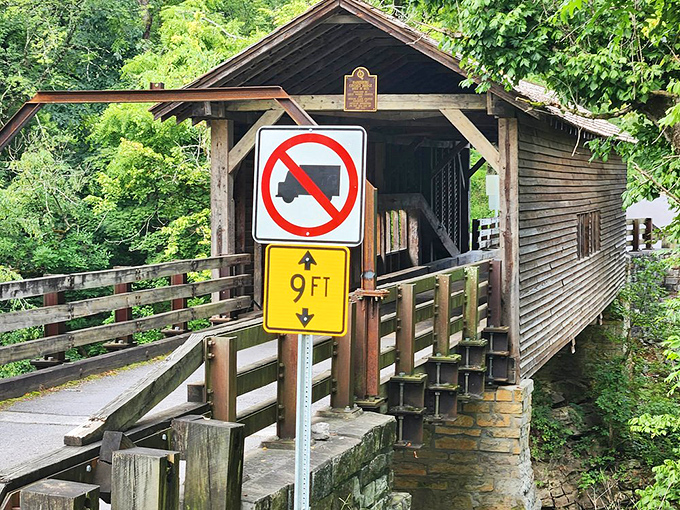 Modern meets historic with this height restriction sign. Even in 1875, nobody was bringing their monster trucks through here.