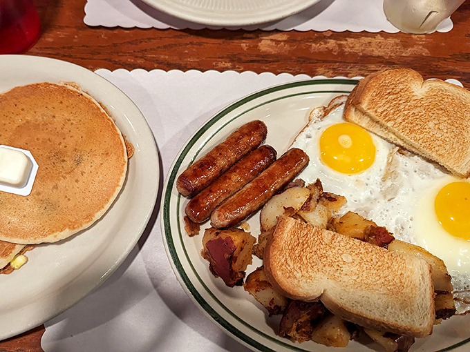 The breakfast that launched a thousand happy days. Golden pancakes, perfectly cooked eggs, and sausages with that ideal snap&mdash;all for less than a fancy coffee elsewhere.