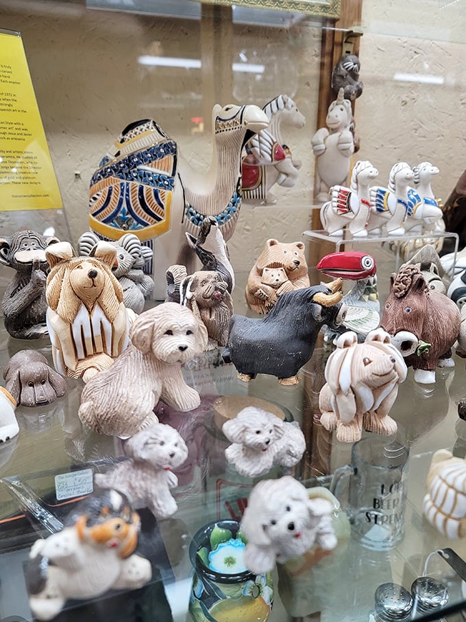 Tiny animal kingdom where ceramic critters never need feeding. Somewhere, a grandmother is pointing at that dog figurine saying, "I had that exact one!"