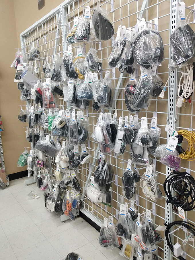 Technological archaeology at its finest! This wall of cables and adapters contains the perfect solution to that weird connection problem you've been ignoring.