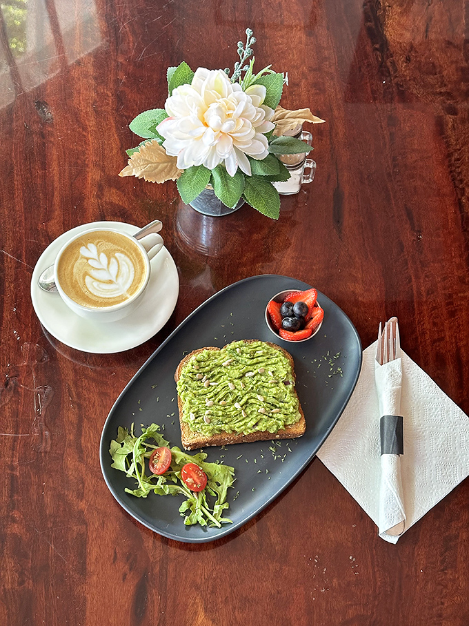 The avocado toast that launched a thousand Instagram posts. Perfectly rippled green goodness on hearty bread with a side of berry-topped happiness.