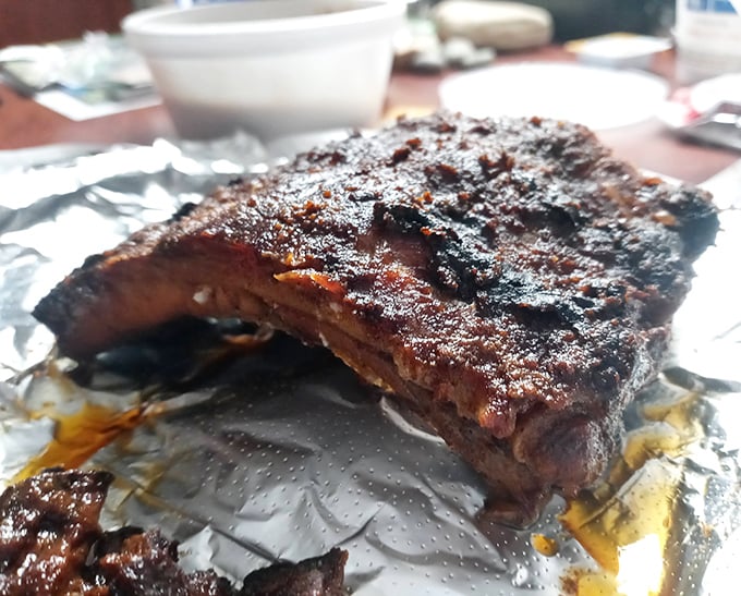 These ribs don't just fall off the bone&mdash;they practically leap into your mouth, glistening with a perfect bark that whispers, "Where have you been all my life?"