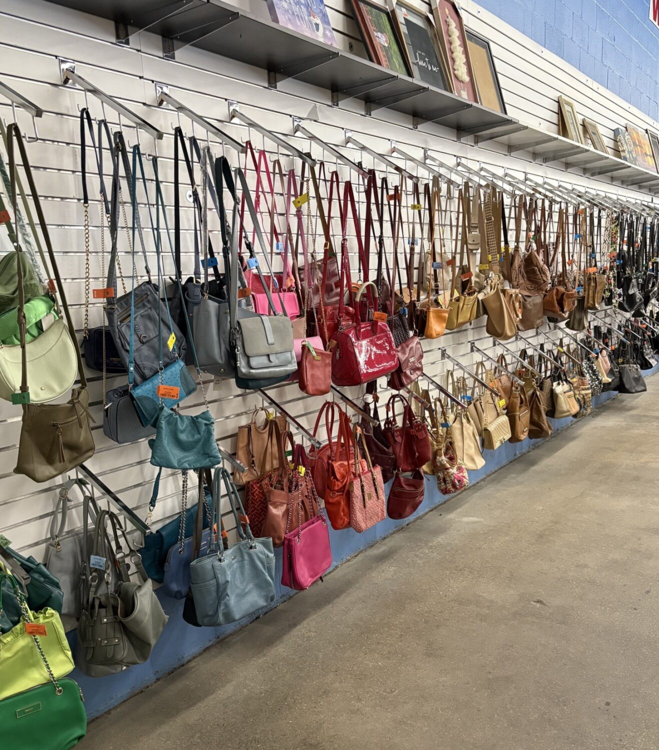 Handbag heaven awaits with a rainbow of leather, canvas, and designer options that would make any accessory enthusiast weak at the knees.