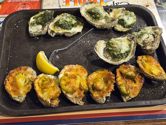 Baked oysters that make you question why you'd ever eat them any other way. Half dressed in cheese, half in herb butter&mdash;a split decision where everyone wins.
