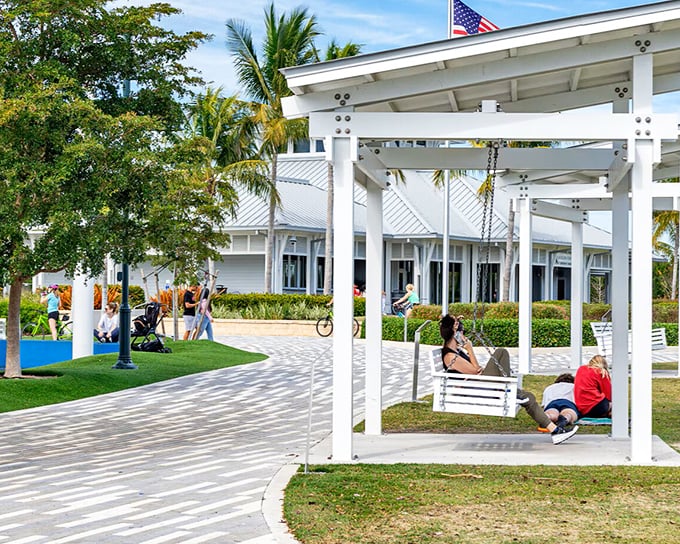 Baker Park's swinging benches invite you to embrace Florida's unofficial pastime: luxurious lounging with a view that makes your friends back home jealous.