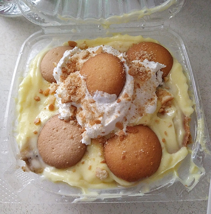 Banana pudding that would make your grandmother both proud and jealous. Those vanilla wafers aren't just floating—they're performing synchronized swimming.