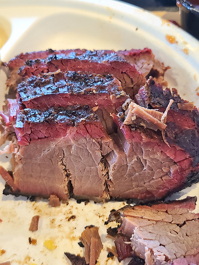 Behold the holy grail of smoked meat&mdash;brisket with that telltale pink smoke ring and bark so perfect it deserves its own fan club.