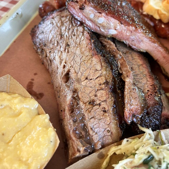Brisket so tender it practically surrenders to your fork. That smoke ring isn't just for show &ndash; it's the barbecue equivalent of a Michelin star.