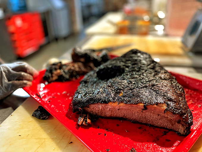 That dark, crusty bark tells you this brisket spent quality time getting acquainted with hardwood and patience.