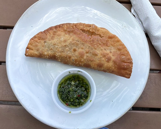 This beef empanada isn't just a snack&mdash;it's a handheld vacation, with a perfectly crimped edge that deserves its own round of applause.