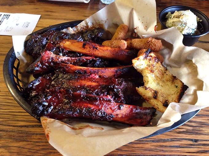 These ribs haven't just been smoked&mdash;they've been coaxed into a state of carnivorous perfection that would make vegetarians question their life choices.
