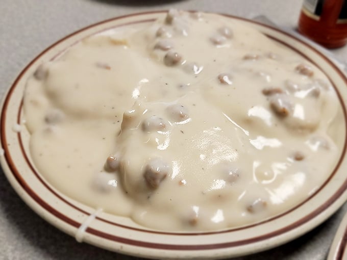 Gravy so good you'll want to swim in it. These biscuits have disappeared under an avalanche of creamy, sausage-studded heaven. 