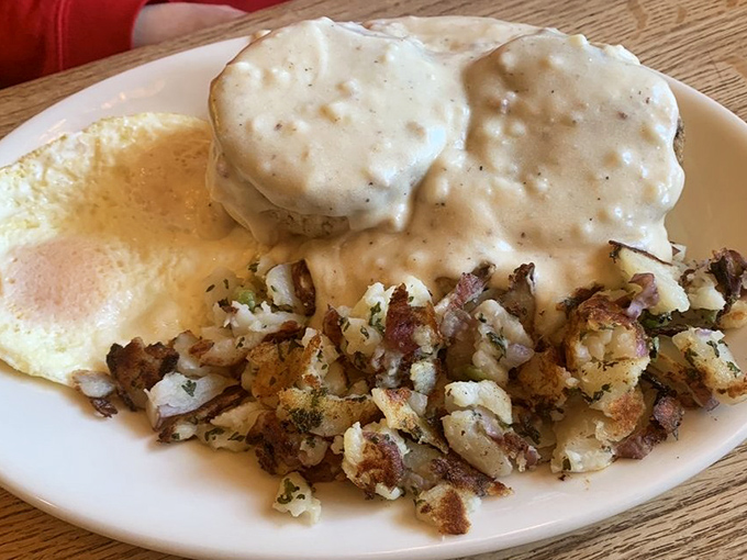 Behold the star attraction! These biscuits and gravy aren't just breakfast&mdash;they're an edible hug that makes you forget all your worries.