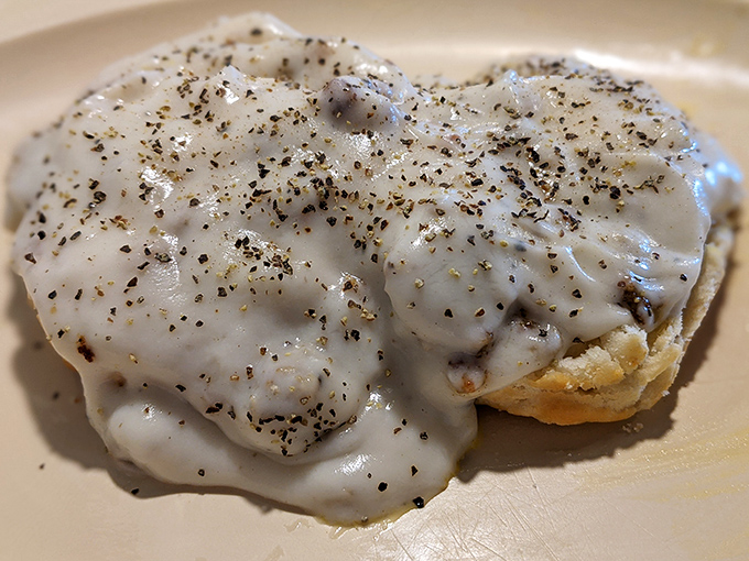 Behold, the biscuit and gravy that launched a thousand food pilgrimages. That pepper-speckled gravy isn't just a topping&mdash;it's a life philosophy.