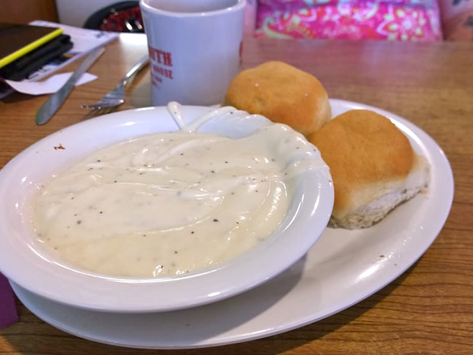 Gravy so creamy it should have its own Instagram account, paired with fresh biscuits that could make your grandmother question her recipe.
