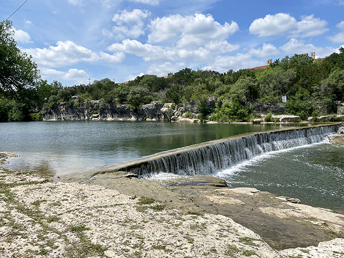 Blue Hole Park's crystal-clear waters and limestone bluffs create a postcard-perfect swimming spot that costs less than your morning coffee.