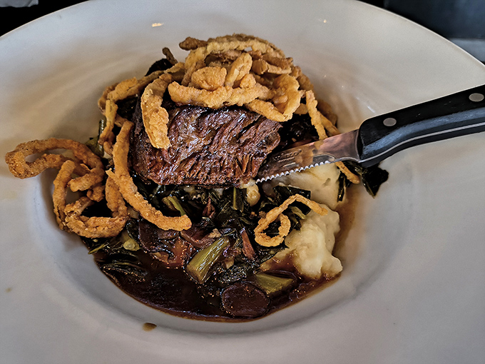 These braised short ribs don't just fall off the bone&mdash;they practically leap onto your fork, surrounded by greens and topped with crispy onions for textural magic.