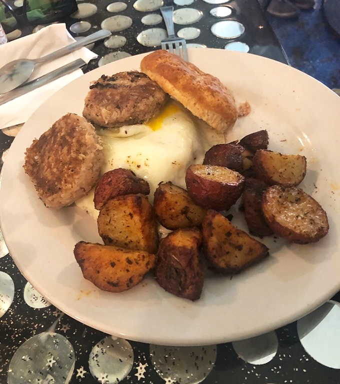 Breakfast perfection doesn't need fancy plating&mdash;just perfectly seasoned potatoes, house-made sausage patties, and grits that would make your Southern grandmother weep with joy.