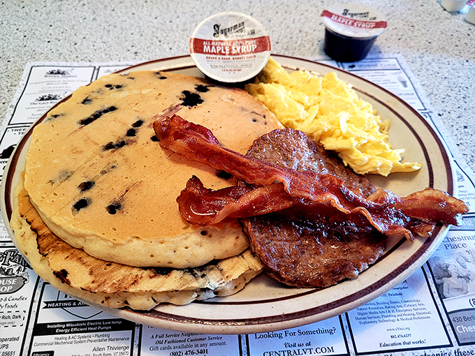 Blueberry pancakes with a side of perfectly crisp bacon—the breakfast equivalent of winning the lottery without having to share the prize.