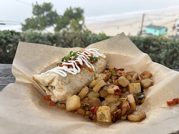 Breakfast with an ocean view? This hearty burrito wrapped in a warm tortilla with crispy potatoes might just ruin all future breakfast experiences.