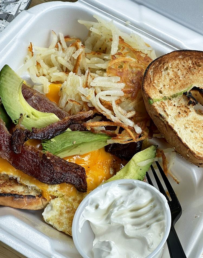 Breakfast architecture at its finest&mdash;crispy hashbrowns, perfectly cooked eggs, avocado, and toast creating the foundation of a perfect Florida morning.