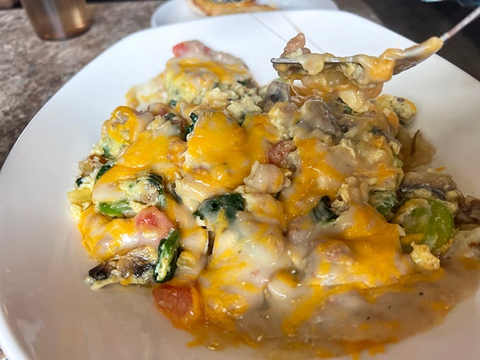 This breakfast skillet doesn't just feed you&mdash;it hugs you from the inside. Melted cheese blankets a medley of eggs, veggies, and breakfast meats like a morning lullaby.