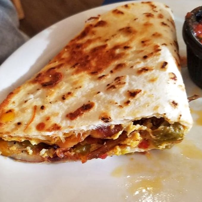 This breakfast taco isn't just food, it's edible architecture &ndash; layers of flavor carefully constructed to create the perfect morning masterpiece. 