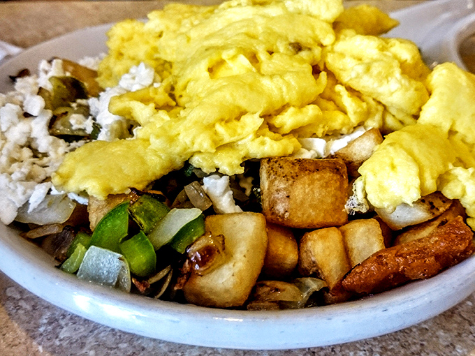 Breakfast alchemy at its finest &ndash; fluffy scrambled eggs crowning a mountain of perfectly seasoned potatoes with just the right amount of crisp.