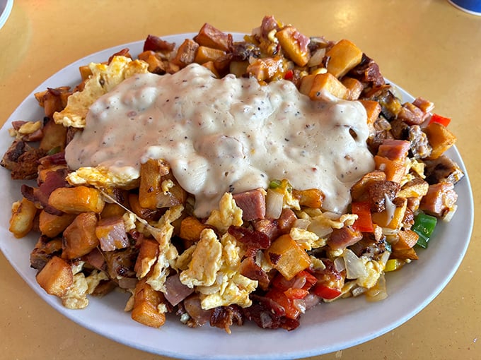 This breakfast poutine doesn't just break your fast &ndash; it demolishes it with a glorious avalanche of gravy, eggs, and potatoes.