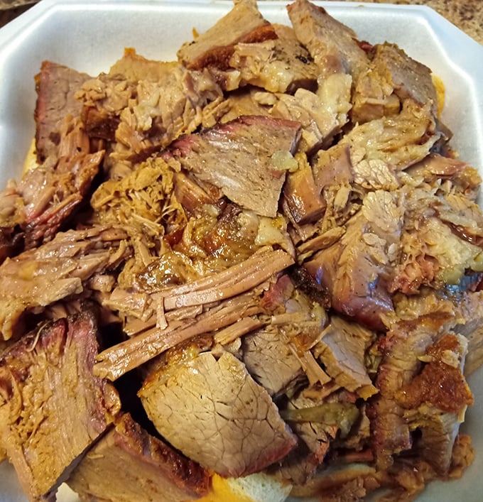 Brisket so tender it practically surrenders to your fork. That bark isn't just for show&mdash;it's a peppery passport to flavor country.