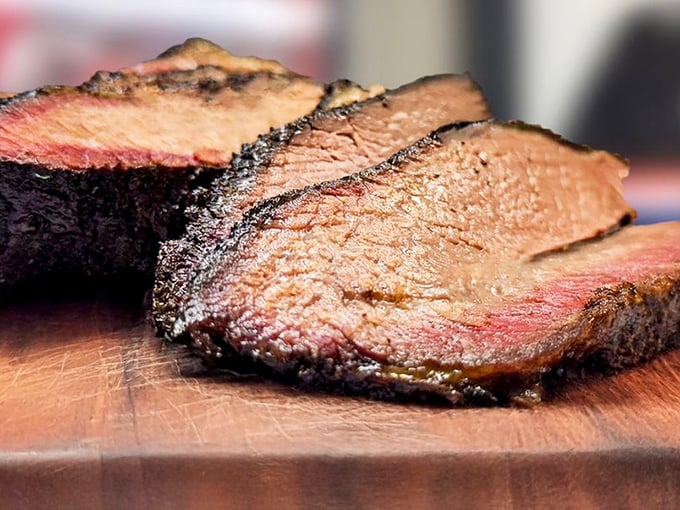 Brisket so perfectly smoked it should have its own Instagram account. That pink smoke ring is the barbecue equivalent of a Michelin star.