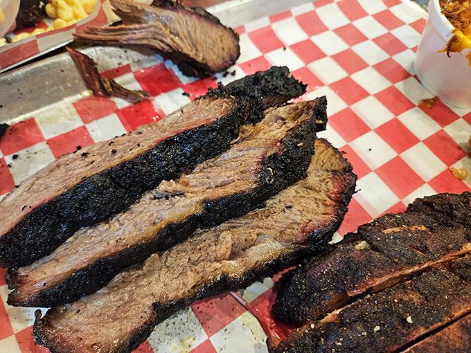 Brisket with that telltale pink smoke ring isn't just good eating—it's edible evidence of patience, expertise, and respect for tradition.