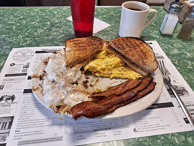 Breakfast of champions! This hearty plate featuring eggs, toast, hash browns and bacon is the fuel that powers Amish Country adventures.
