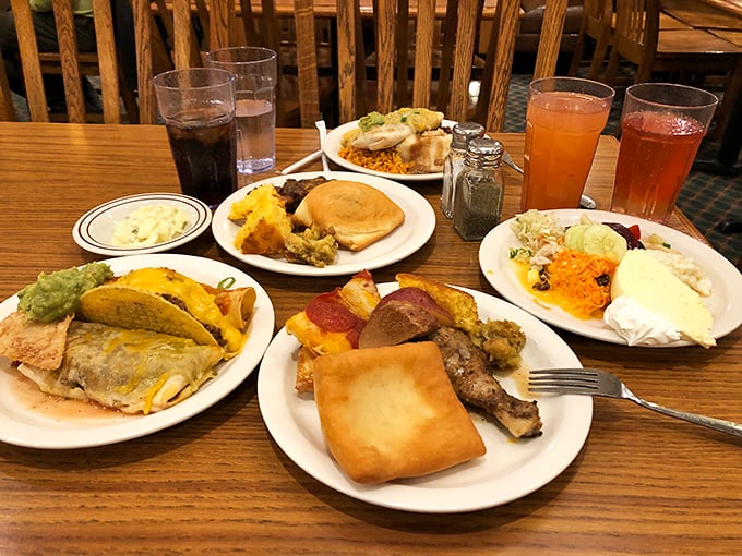 A table of treasures that tells the true Chuck-A-Rama story&mdash;multiple plates, diverse selections, and the beautiful chaos of buffet abundance done right.