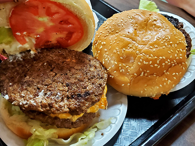 These aren't architectural burger towers requiring an engineering degree to eat—they're honest-to-goodness hand-formed patties that remind you why classics never go out of style.