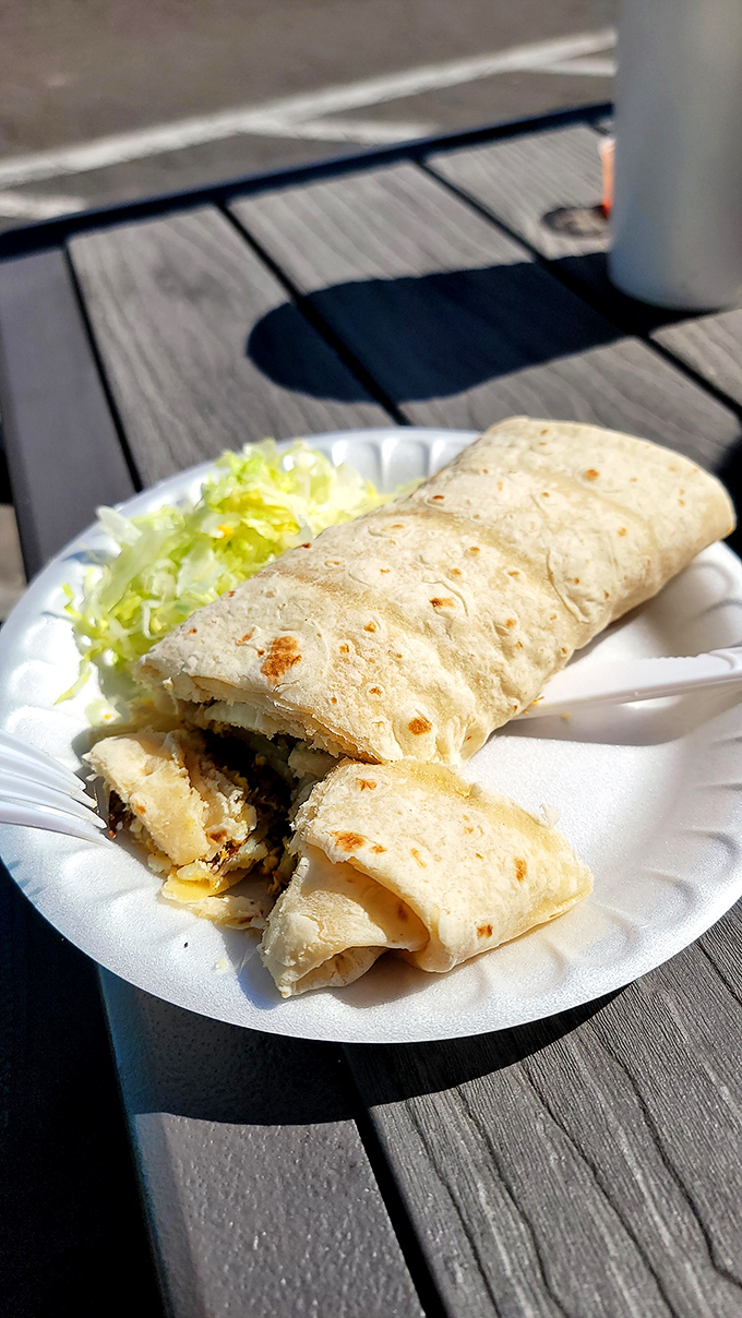 Behold the humble burrito&mdash;architectural perfection wrapped in a tortilla. That slight char on the outside is nature's way of saying "you're welcome."