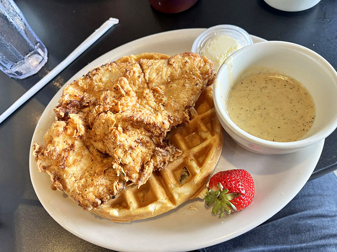 Behold the dish that launched a thousand road trips &ndash; crispy fried perfection meets Belgian waffle bliss in holy matrimony.