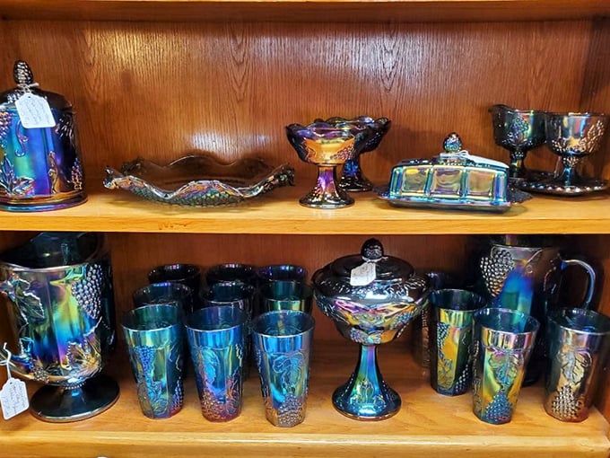 Carnival glass collection shimmering with iridescent blues &ndash; these aren't just drinking vessels, they're liquid rainbows waiting to elevate your sweet tea.