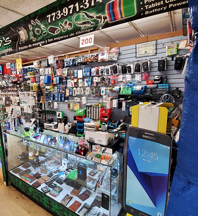 Tech paradise or phone doctor? This booth resurrects devices most Apple geniuses would pronounce dead on arrival, all while speaking multiple languages. 