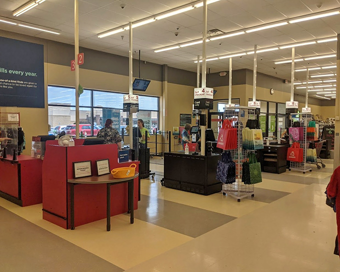 The checkout area gleams with organization, proving thrift stores can be as clean and modern as anywhere else.