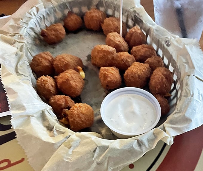 Behold the golden orbs of happiness! These cheese curds aren't just fried&mdash;they're transformed into crunchy-outside, gooey-inside morsels of Wisconsin soul.