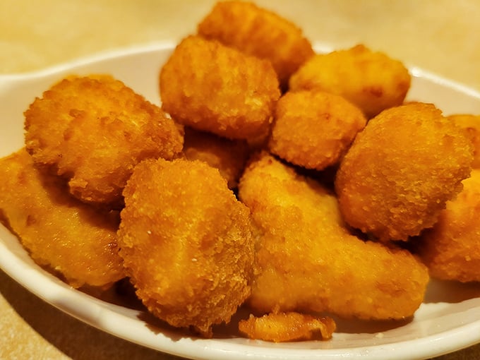 Golden-brown cheese curds that make that perfect Wisconsin squeak&mdash;like tiny dairy angels singing directly to your taste buds.