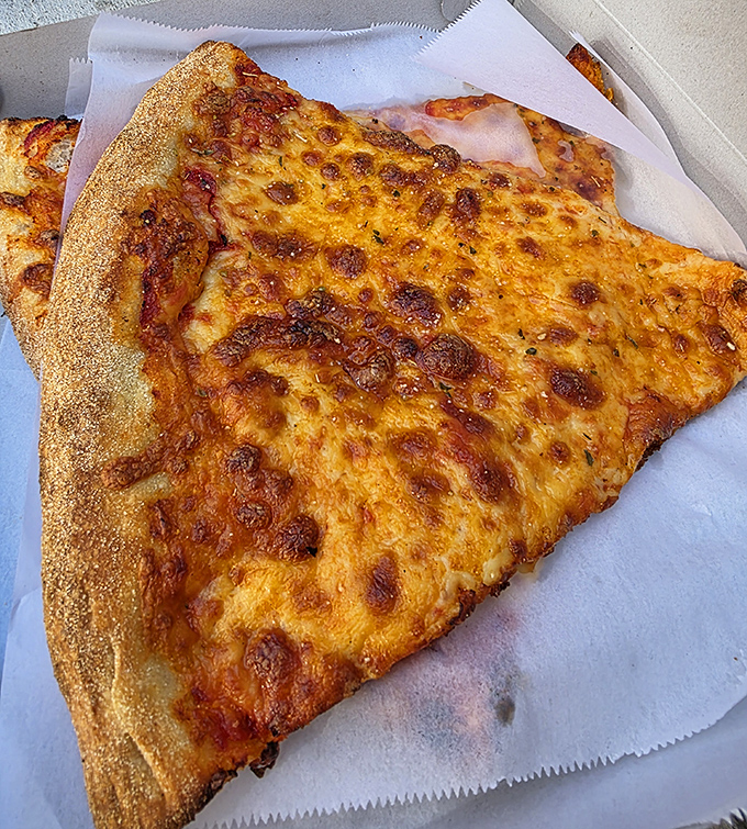 This isn't just cheese pizza&mdash;it's a masterclass in simplicity, with a crust that achieves the perfect balance of crisp and chew.