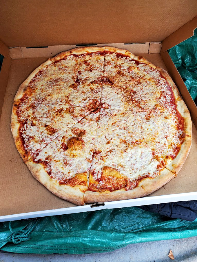 The classic cheese pie in all its glory&mdash;28 inches of thin-crust perfection that makes New Yorkers question their loyalty.