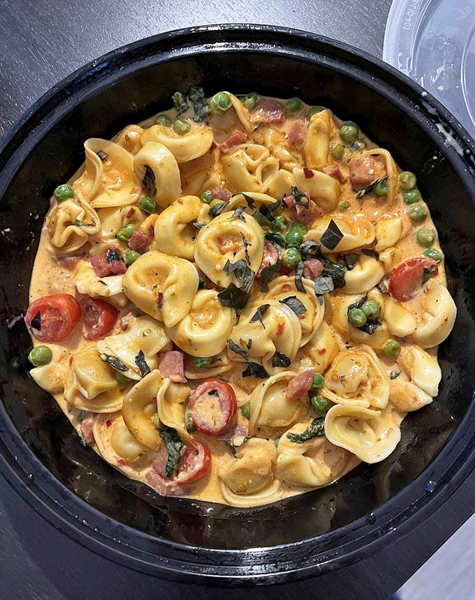 The award-winning cheese tortellini isn't just pasta&mdash;it's edible poetry. Those little pillows of joy swimming in tomato cream sauce might just make you weep with happiness.